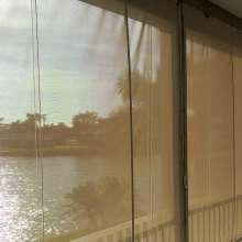 Retractable Exterior Roll Curtains - Awning Works Inc.