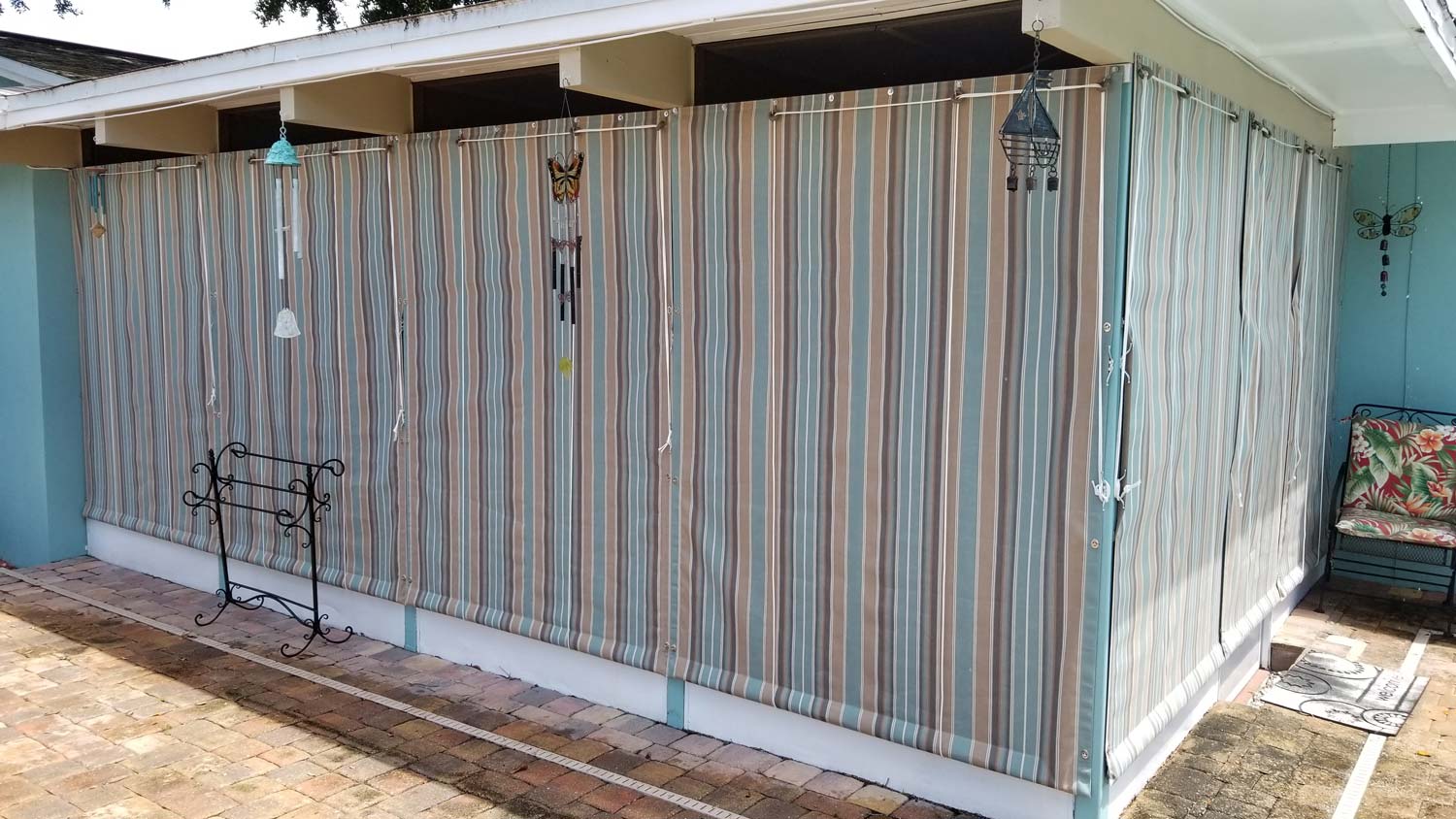 Retractable Exterior Roll Curtains - Awning Works Inc.