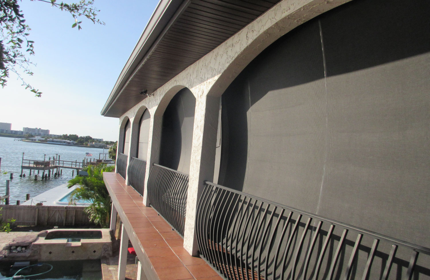 Retractable Exterior Solar Shades - Awning Works Inc.